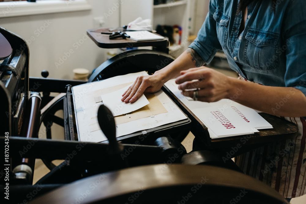 Letterpress artist in her studio Stock Photo | Adobe Stock