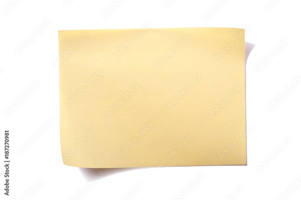 One single yellow oblong sticky post it note with curled corner and ...