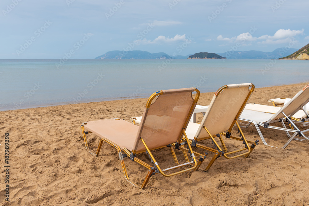 Sunbeds and parasols on beautiful Gerakas beach. Zakynthos island ...