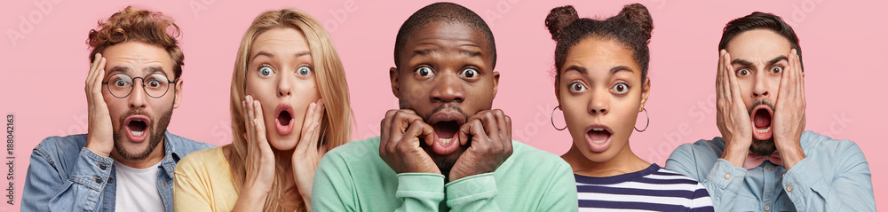 Stockfoto Shocked stupefied dark skinned man and their companions pose ...