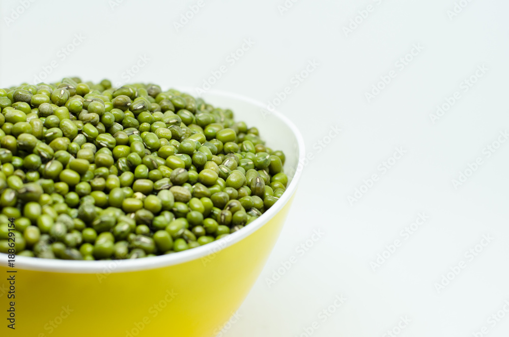 Mung beans in yellow bowl isolated on white background. also known as ...