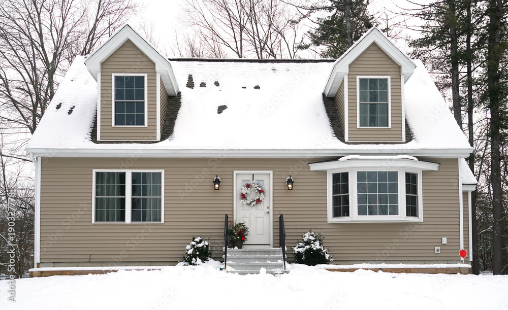 Facade view of residential house after snow in winter Stock Photo ...