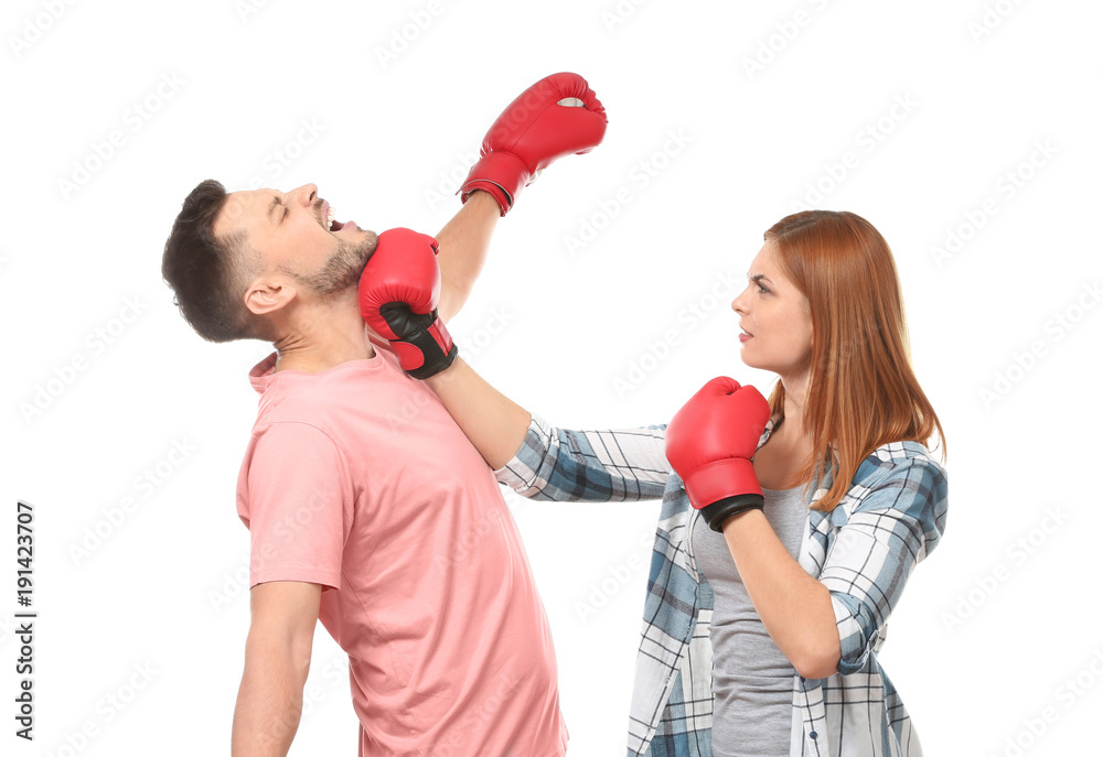 Angry couple in boxing gloves fighting on white background Stock Photo ...