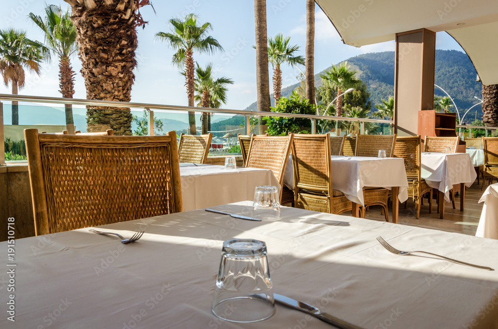 Served tables breakfast of the restaurant on the beach palm resort ...