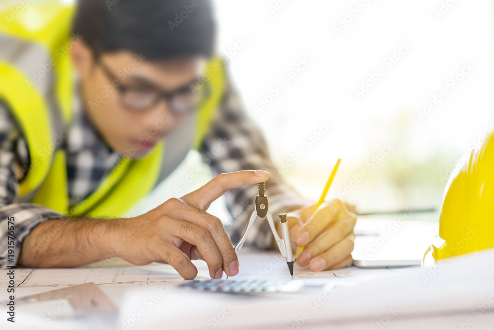 architect man working with laptop and blueprints,engineer inspection in ...