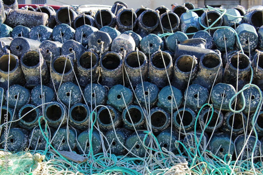 Traps to fish octopus and nets in the pier of Santa Pola Stock Photo ...