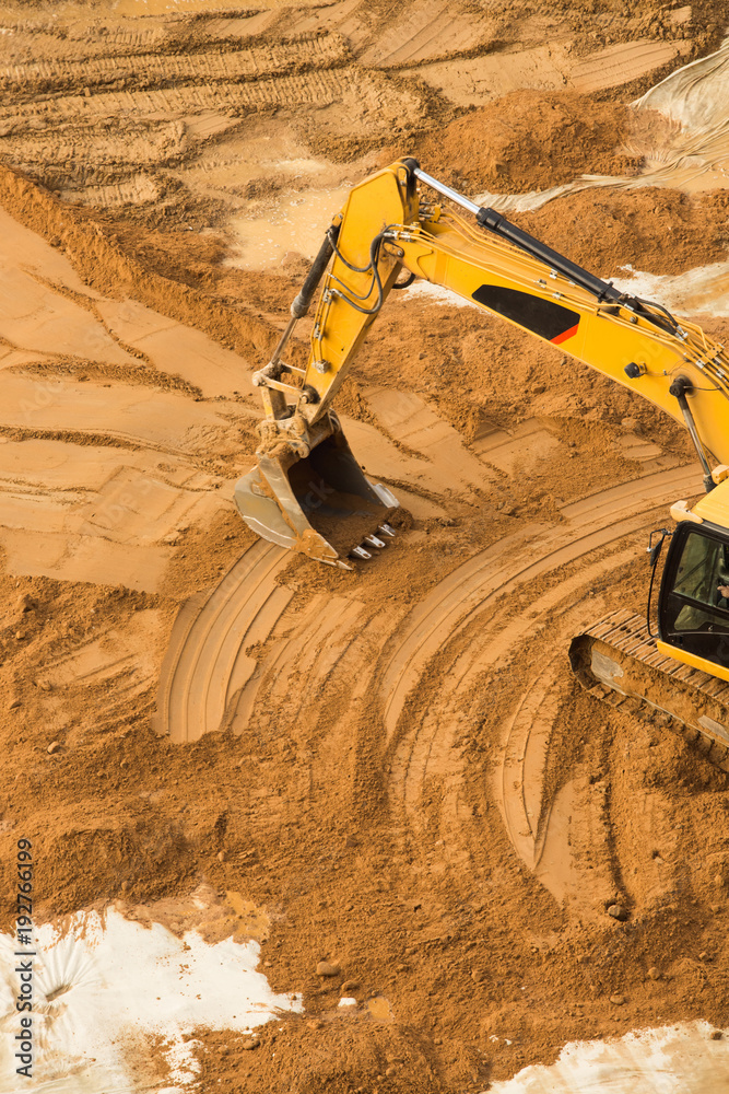 Working Excavator Tractor Digging A Trench. Stock Photo | Adobe Stock