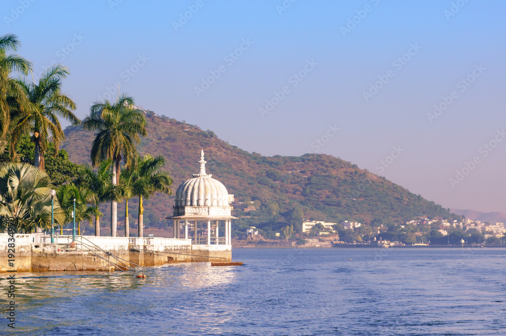 Nehru island on fateh sagar lake in Udaipur india. The white domes and ...