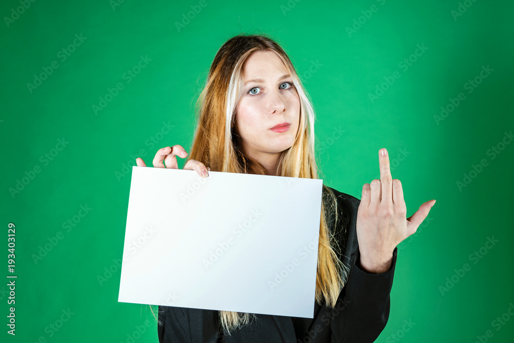 Attractive young blonde model holds an empty white card and shows a ...