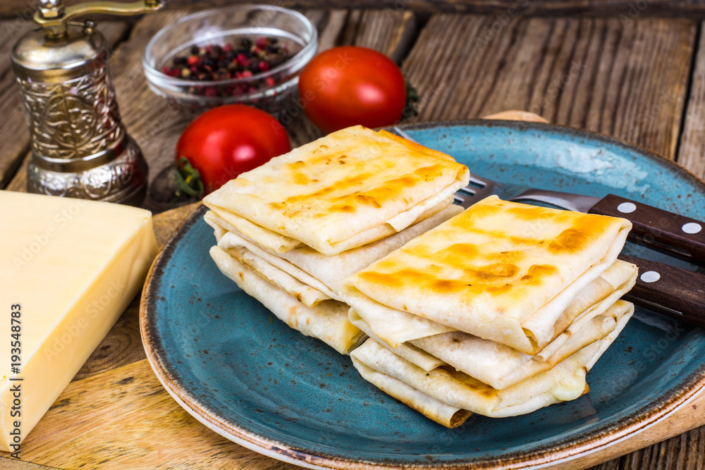 Envelopes of thin Armenian bread lavash fried with crispy crust ...