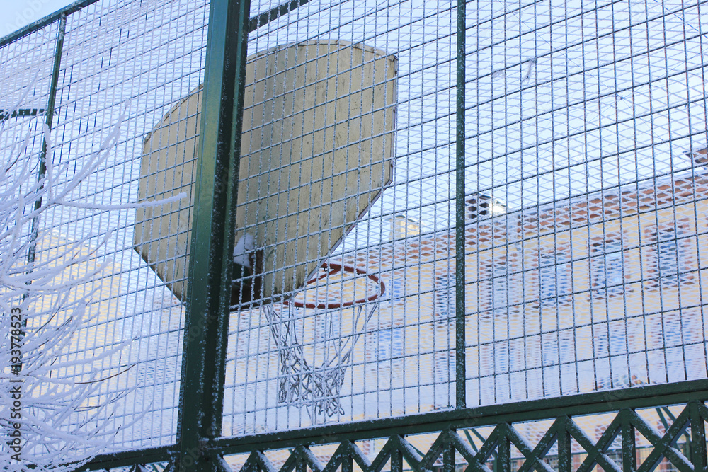 Basketball Hoop on Winter at Sports Ground Covered in Snow. Basketball ...