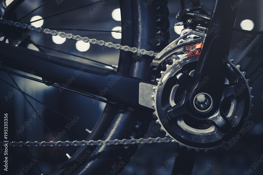 Closeup of a mechanism of bicycle mechanisms and chain on a mountain ...