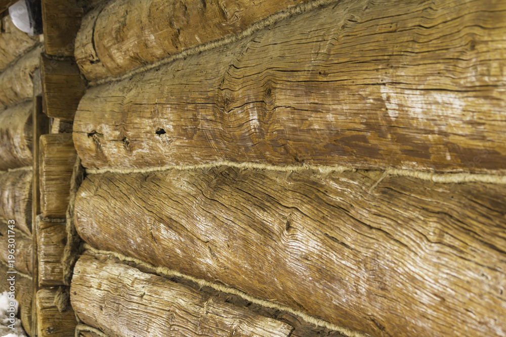 Wooden restored barn. Built in the 18th century. A log wall and a ...