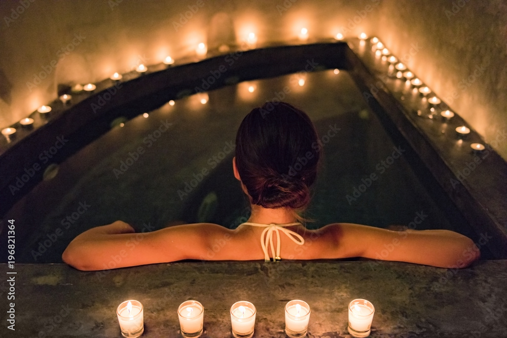 Stock-Foto „Spa luxury jacuzzi woman relaxing in whirlpool hot tub with ...