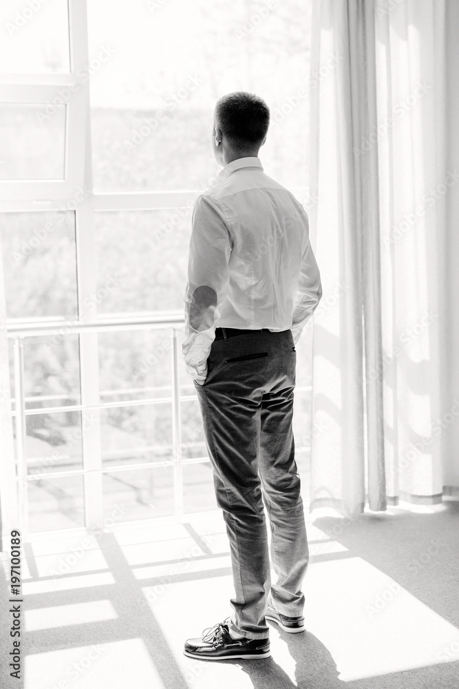 guy standing back turned