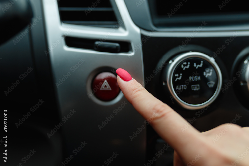 turning on car air conditioning system,finger hitting car emergency ...