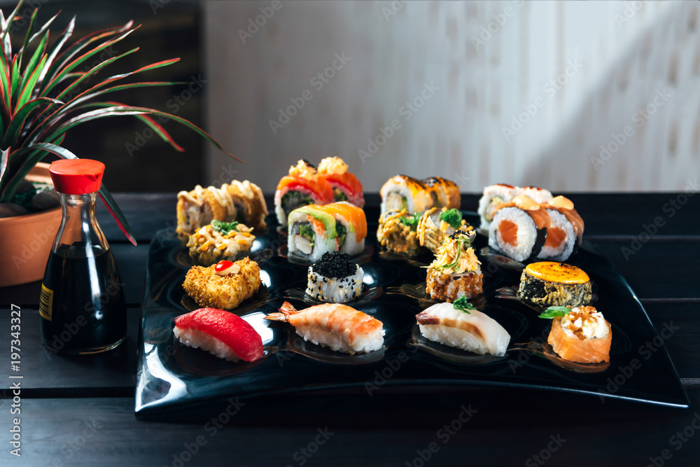 Rainbow Sushi Roll with salmon, eel, tuna, avocado, royal prawn, cream ...