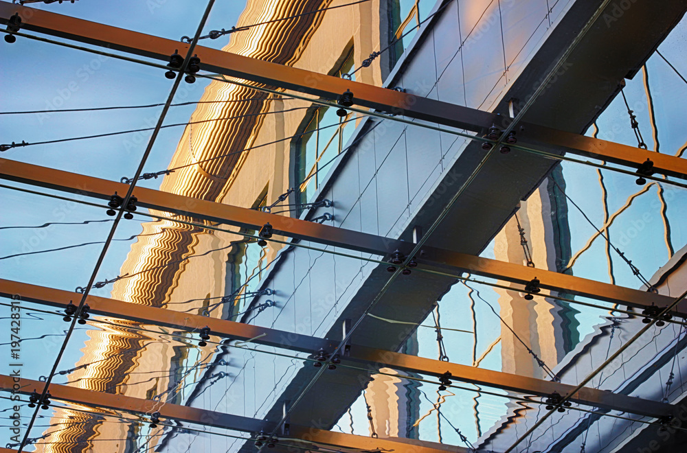 Metalware with glass. The ceiling of the canopy of a modern building ...