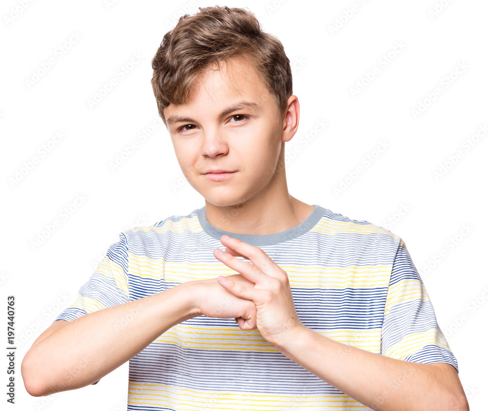 Angry teen boy. Hand gesture the fist smashed into the palm. Young ...