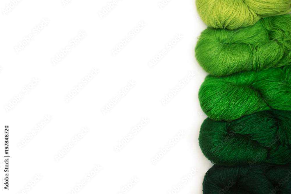 Top view of green threads on the white background Stock Photo | Adobe Stock