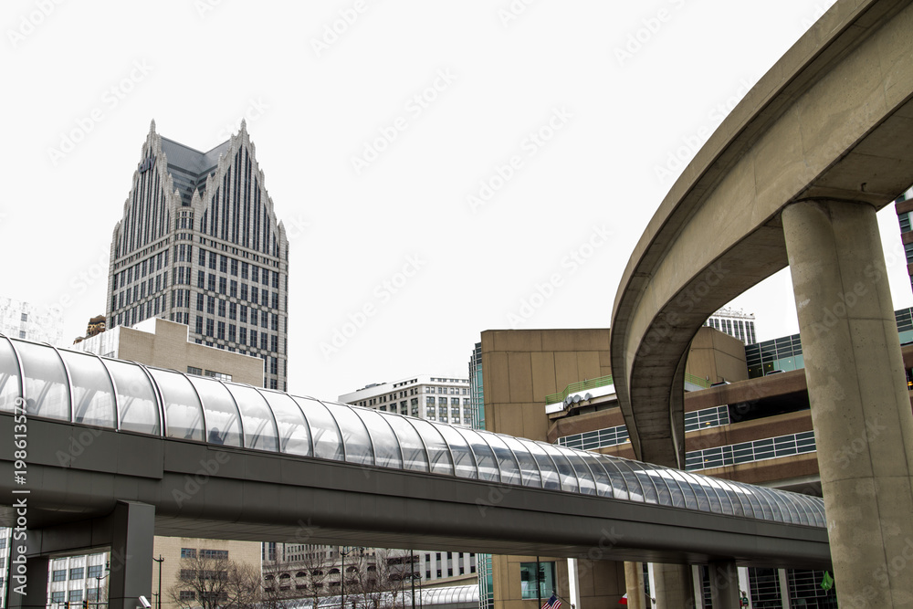 Getting Around Detroit. Downtown skyline with a pedestrian bridge ...