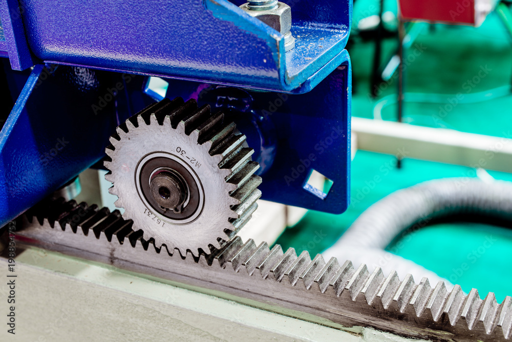 Metal cog tooth wheel and rack Stock Photo | Adobe Stock