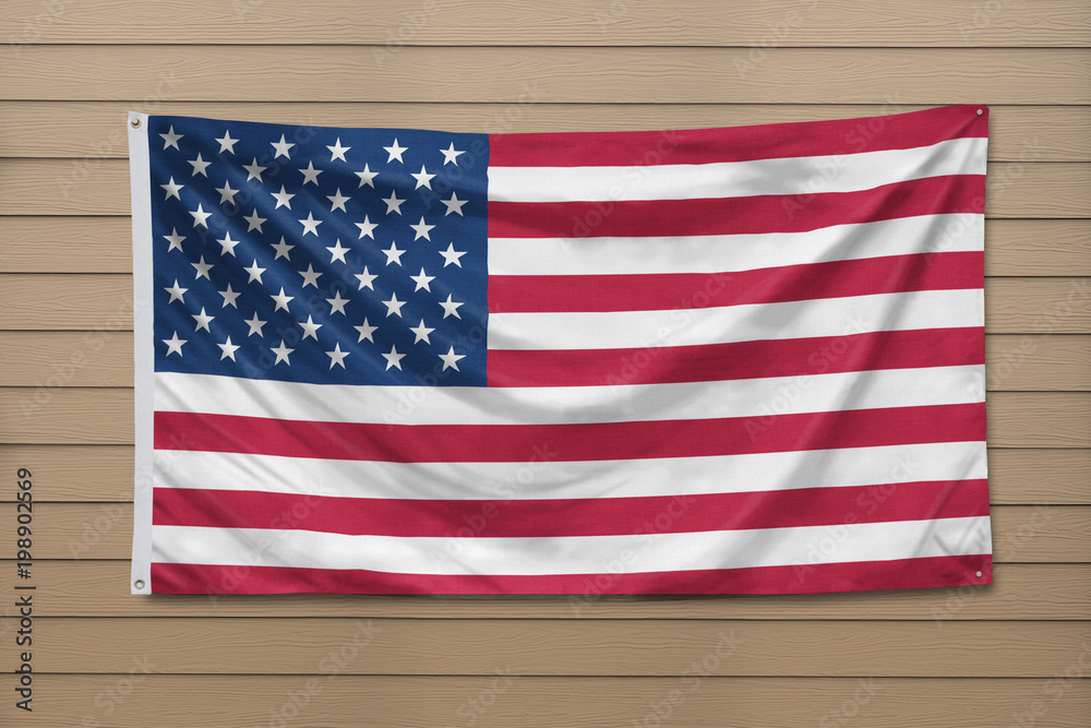 USA Flag hanging on a wall Stock Photo | Adobe Stock