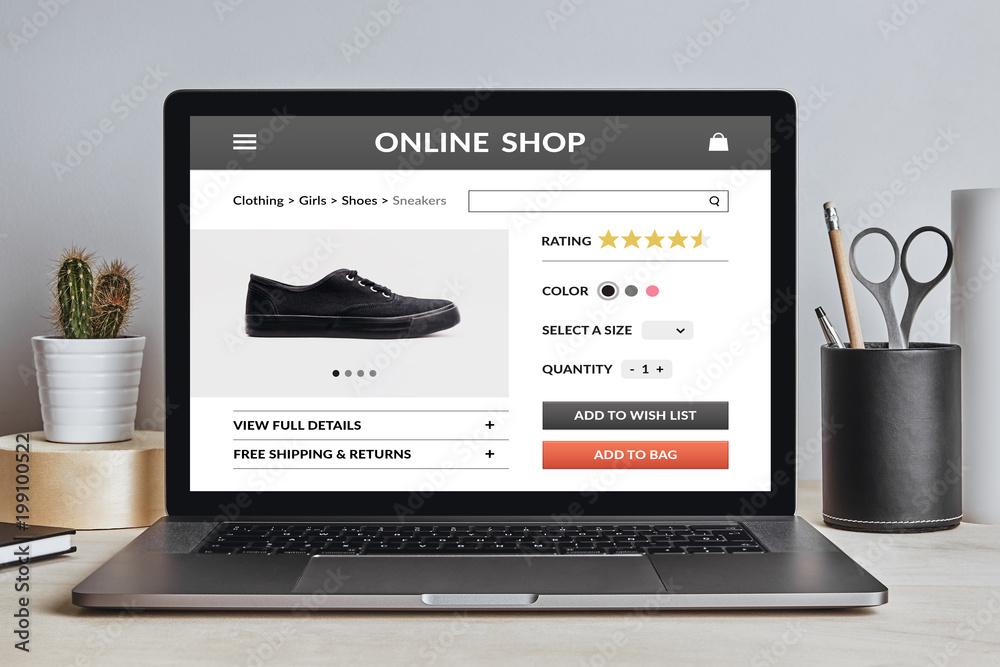 Online shop concept on laptop screen on modern desk. All screen content ...