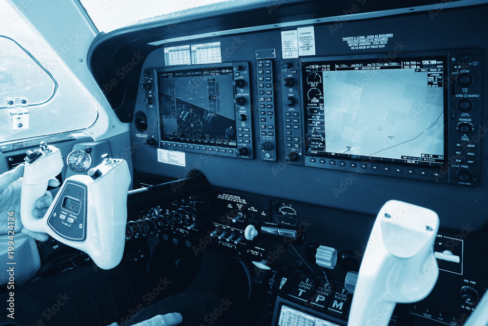 Cockpit of small, sport aircraft. A view of a glass cockpit dashboard ...