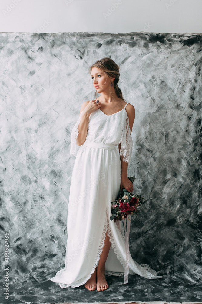 Beautiful young bride in wedding dress on canvas background with pastel ...