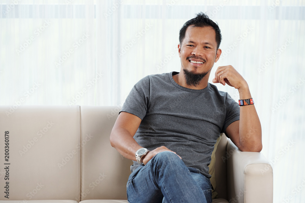 Joyful Filipino man Stock Photo | Adobe Stock