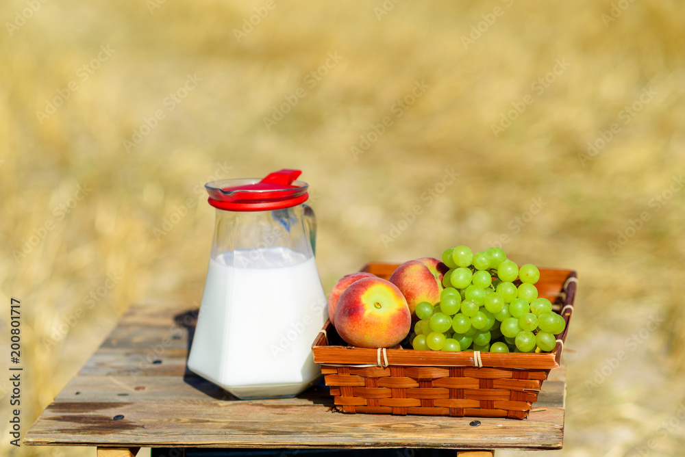 Foto de Stock First fruits, habikkurim in hebrew and milk on wooden ...