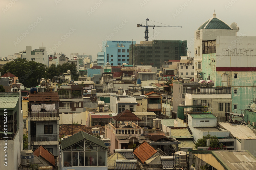 Asian houses in slum area, they look poor and unhappy. You can see ...