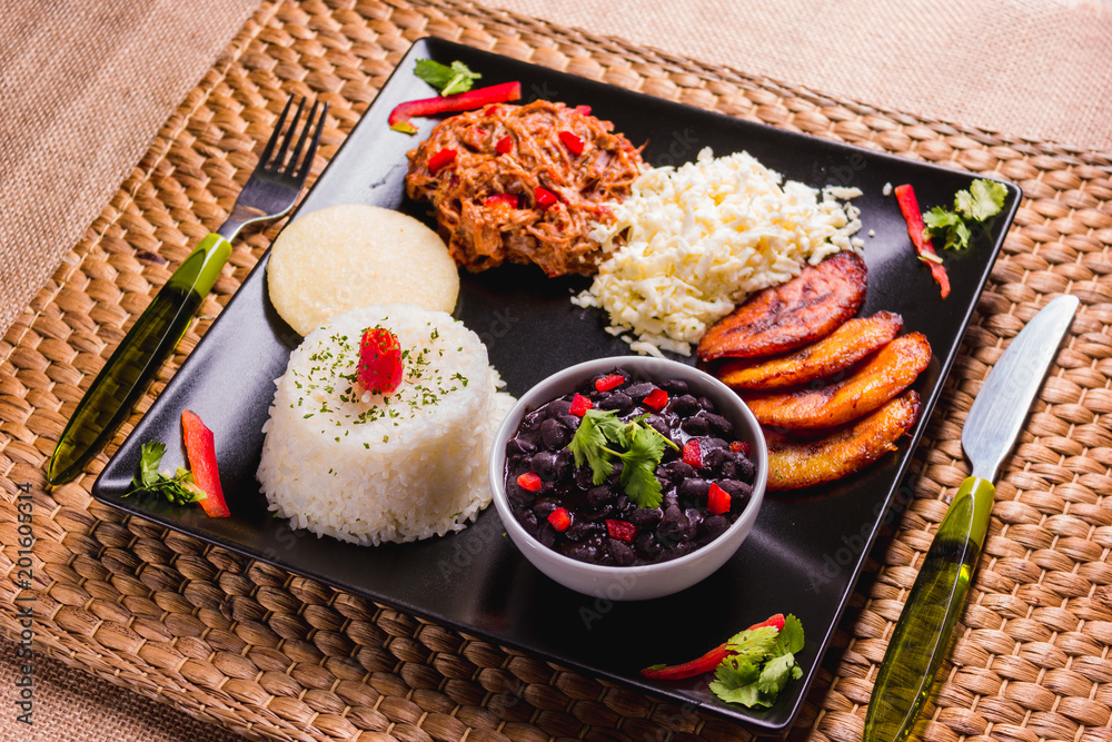 Pabellón criollo, Venezuelan food that has rice, meat, black beans ...