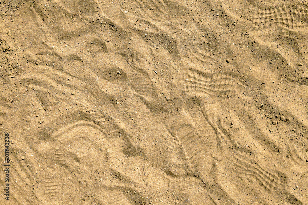 Footprints in sand on playpit. Top view. Sand in sand-pit, overhead ...