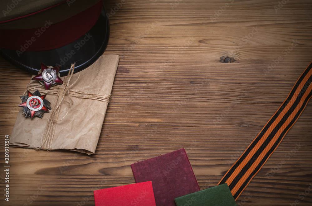 9 nine may Victory day. Medal of red banner, military cap and notes ...