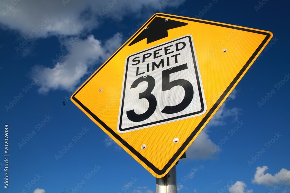 Looking Up at Speed Limit 35 Mph with Black Lettering on White ...