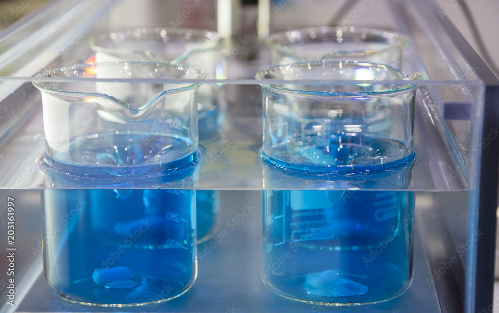 Beaker on magnetic stirrer Stock Photo | Adobe Stock