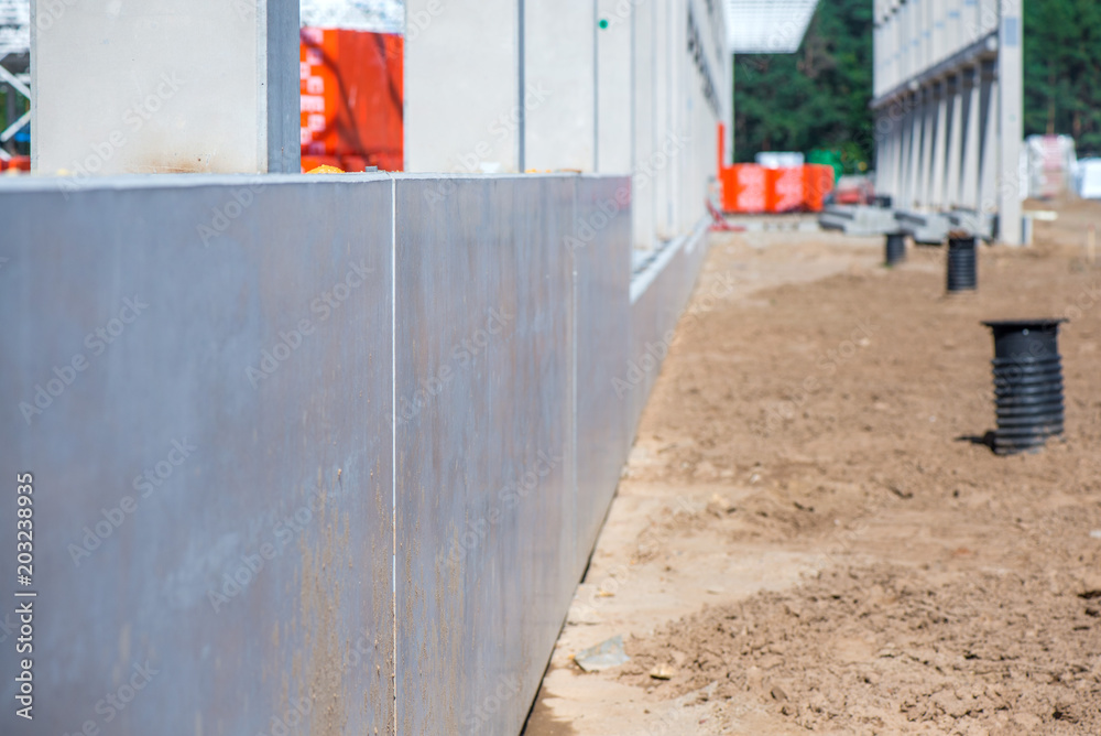 Industrial construction site of new shopping mall in a city. Reinforced ...