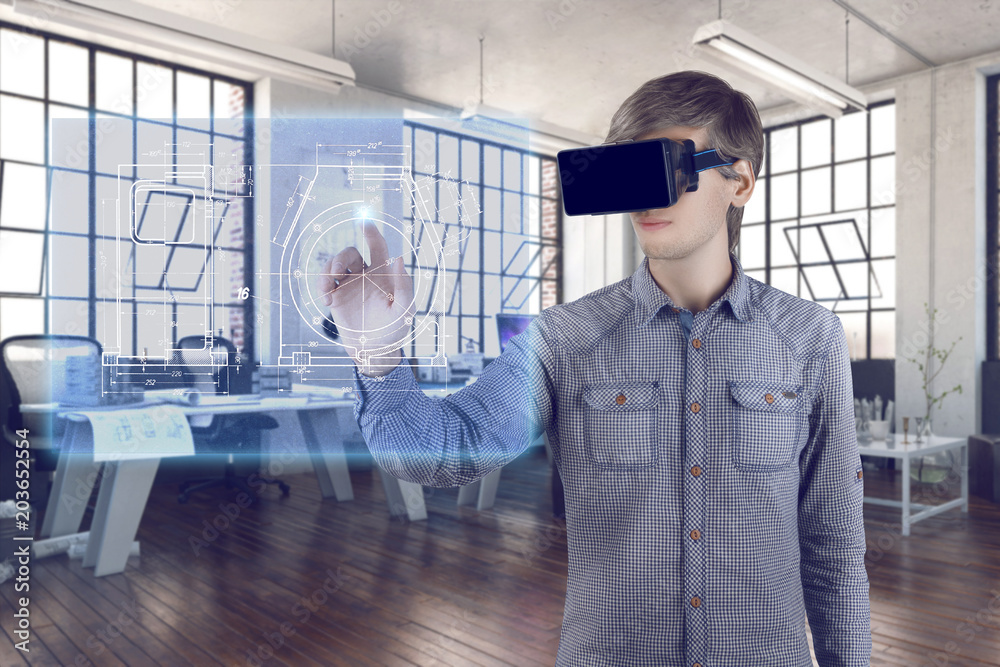 Futuristic engineer workplace. Male / man wearing shirt and vr glasses ...