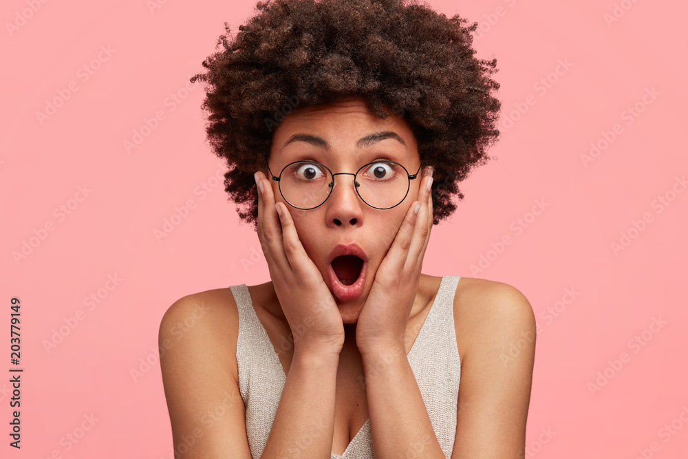 Headshot of good looking surprised scared dark skinned mixed race ...