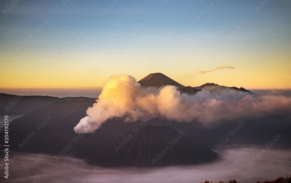 View of volcanoes at sunrise, smoking volcano Gunung Bromo, Batok ...