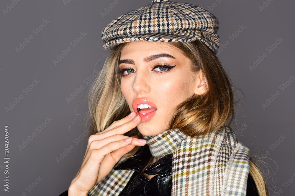 Woman on seductive face with make up with checkered accessories. Girl ...