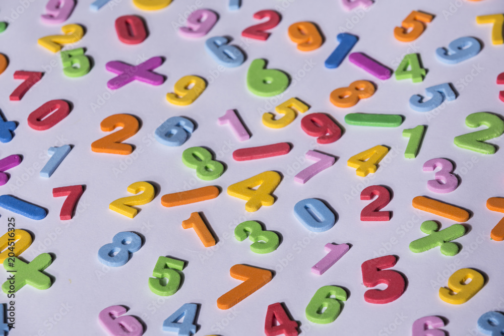 Números de colores y signos matemáticos. Stock Photo | Adobe Stock