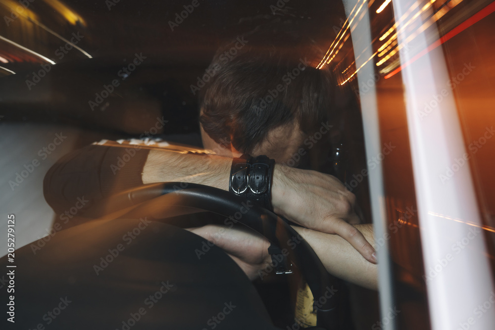 Upset male driver is caught driving under alcohol influence. Man ...