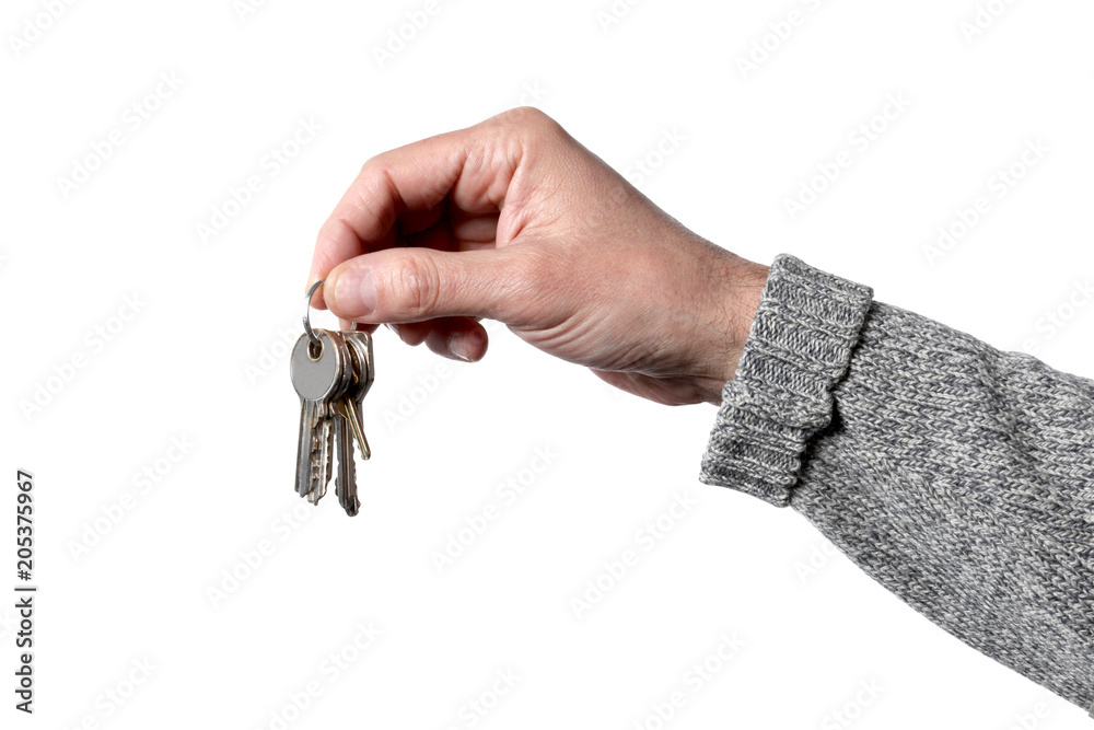 caucasian man's hand holding keys isolated on white background with ...
