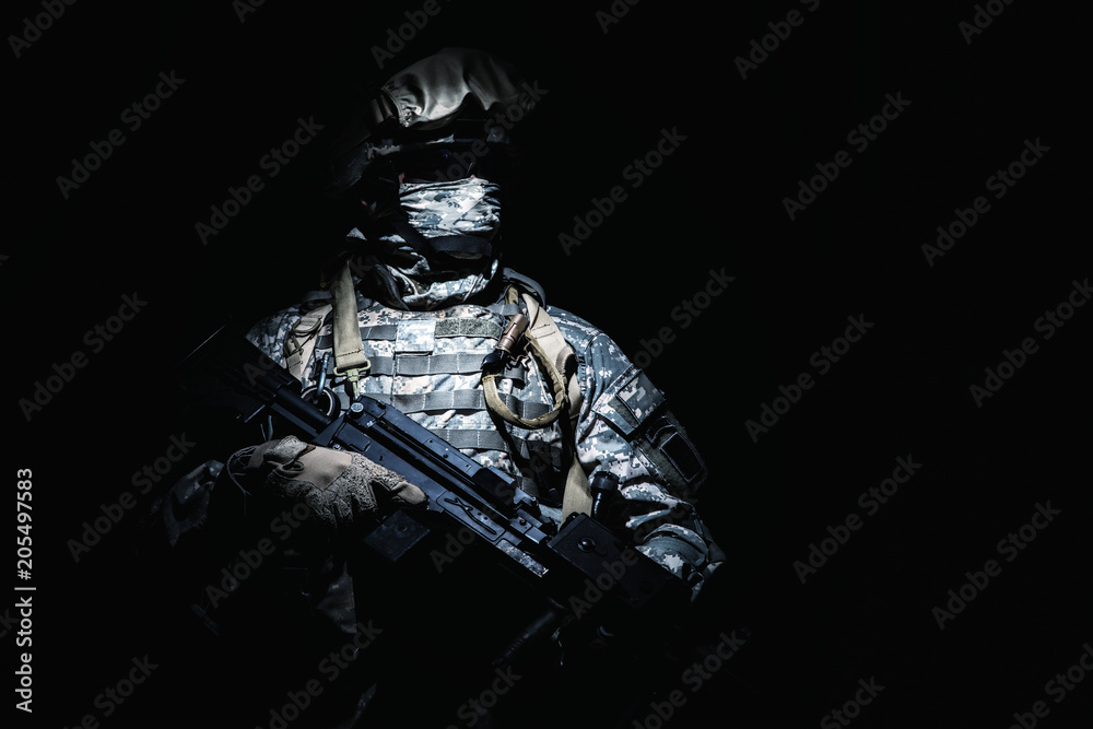 United States Armed Forces soldier in battledress with black glasses ...