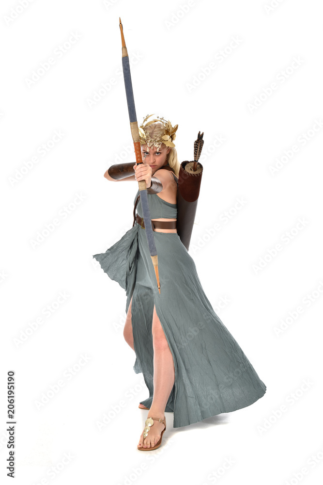 full length portrait of pretty blonde lady wearing fantasy toga gown ...