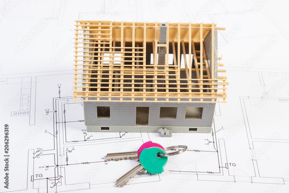 Electrical drawings and diagrams with house under construction and home ...