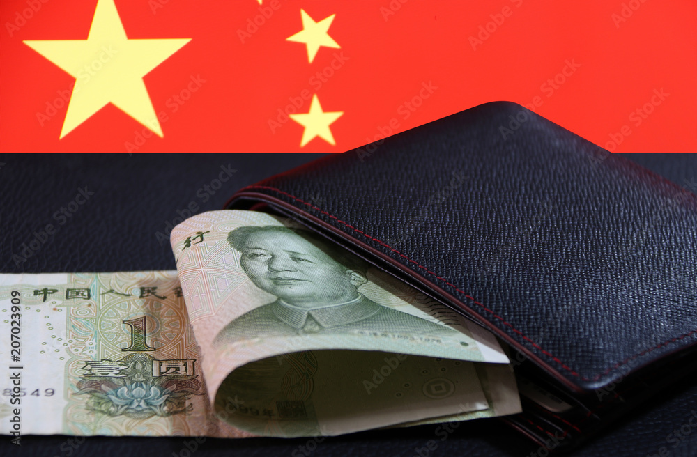 Yuan banknote of China with black wallet on the black floor with ...
